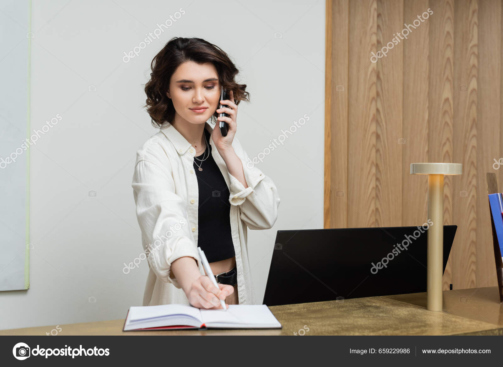 Joyful Receptionist Wavy Brunette Hair Working Front Desk Writing ...