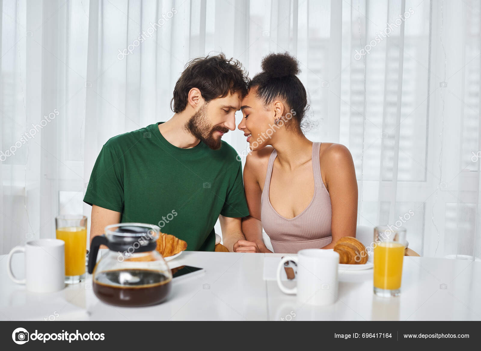 Joyous Good Looking Multicultural Couple Posing Lovingly Together ... Joyous Good Looking Multicultural Couple Posing Lovingly Together ...