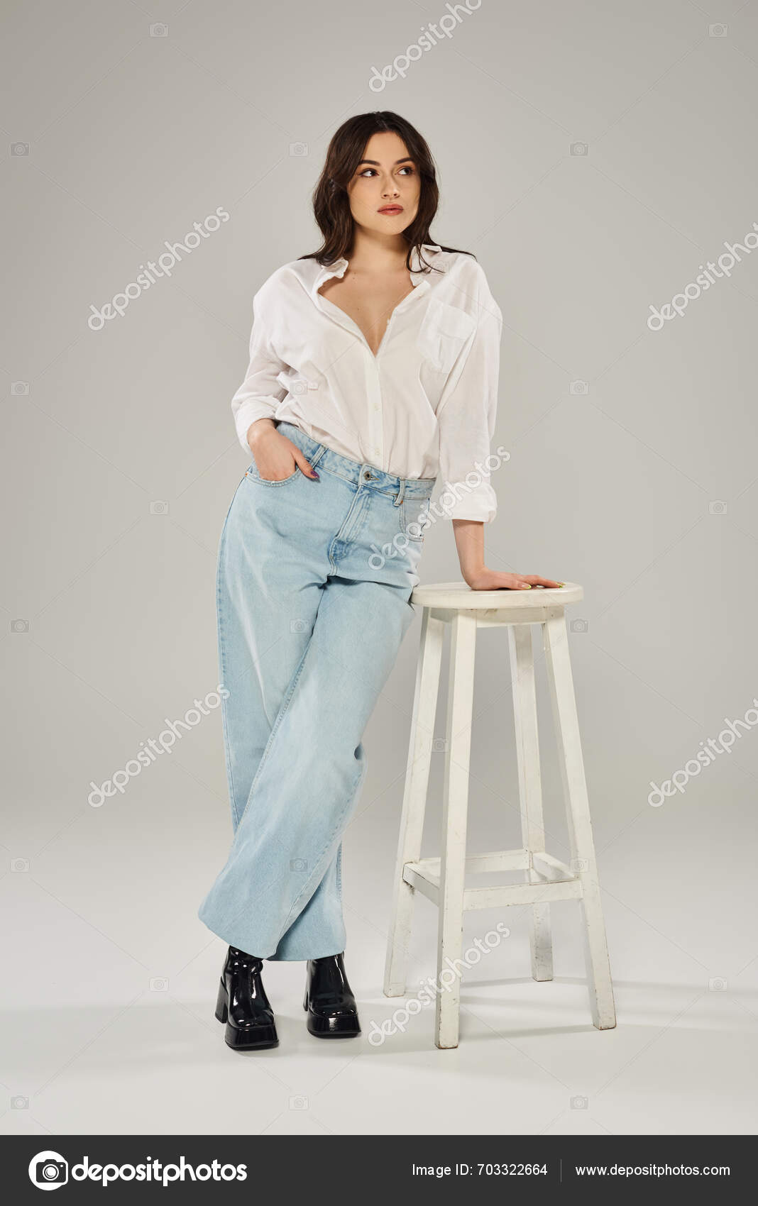 Beautiful Size Woman White Shirt Jeans Poses Gracefully She Leans ...