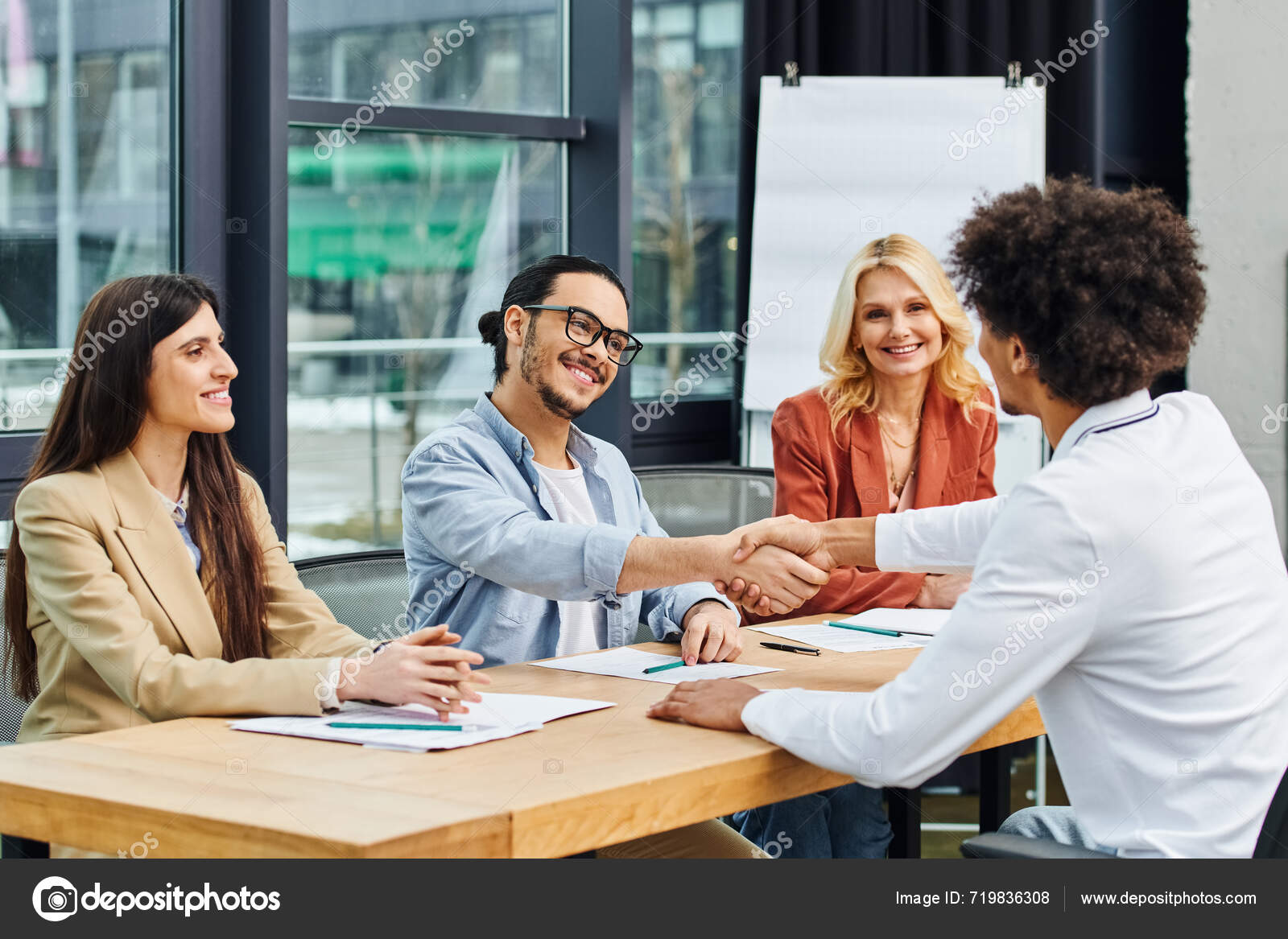 Group Job Seekers Shaking Hands Table Successful Networking Session ...