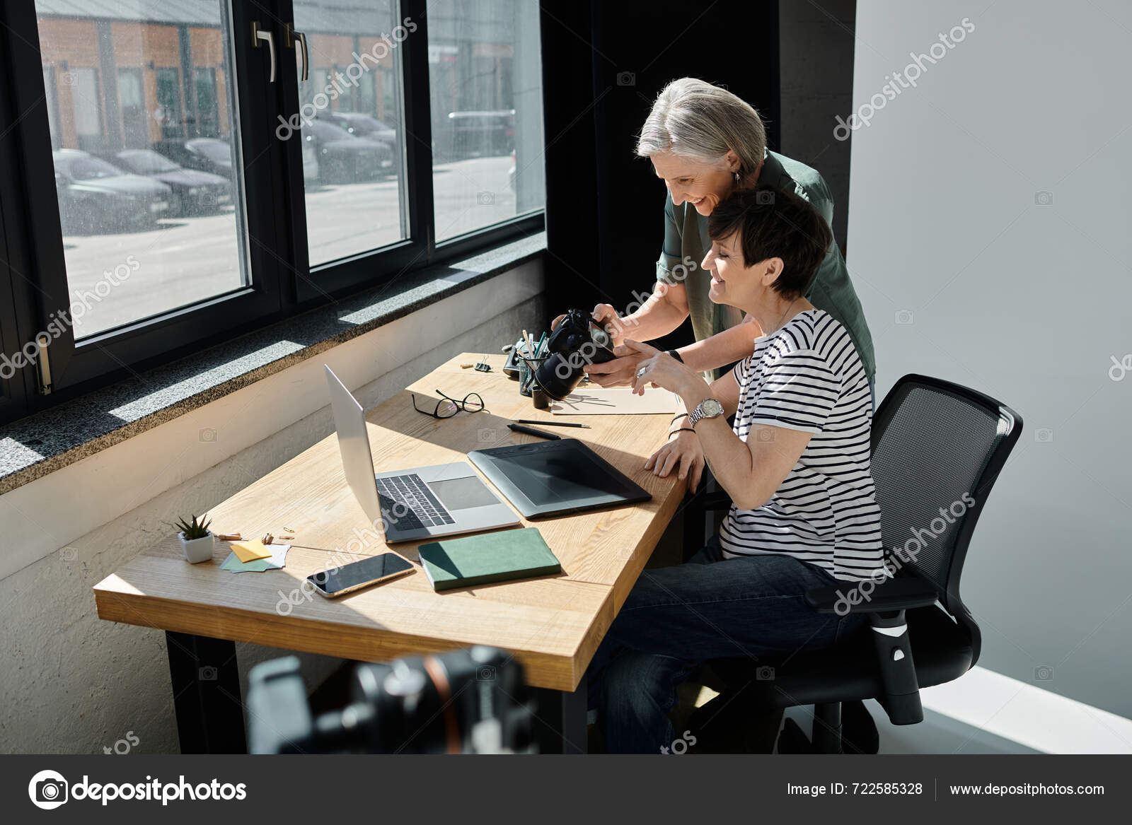 Women Engaging Creative Task Together Desk Modern Studio Setting ...