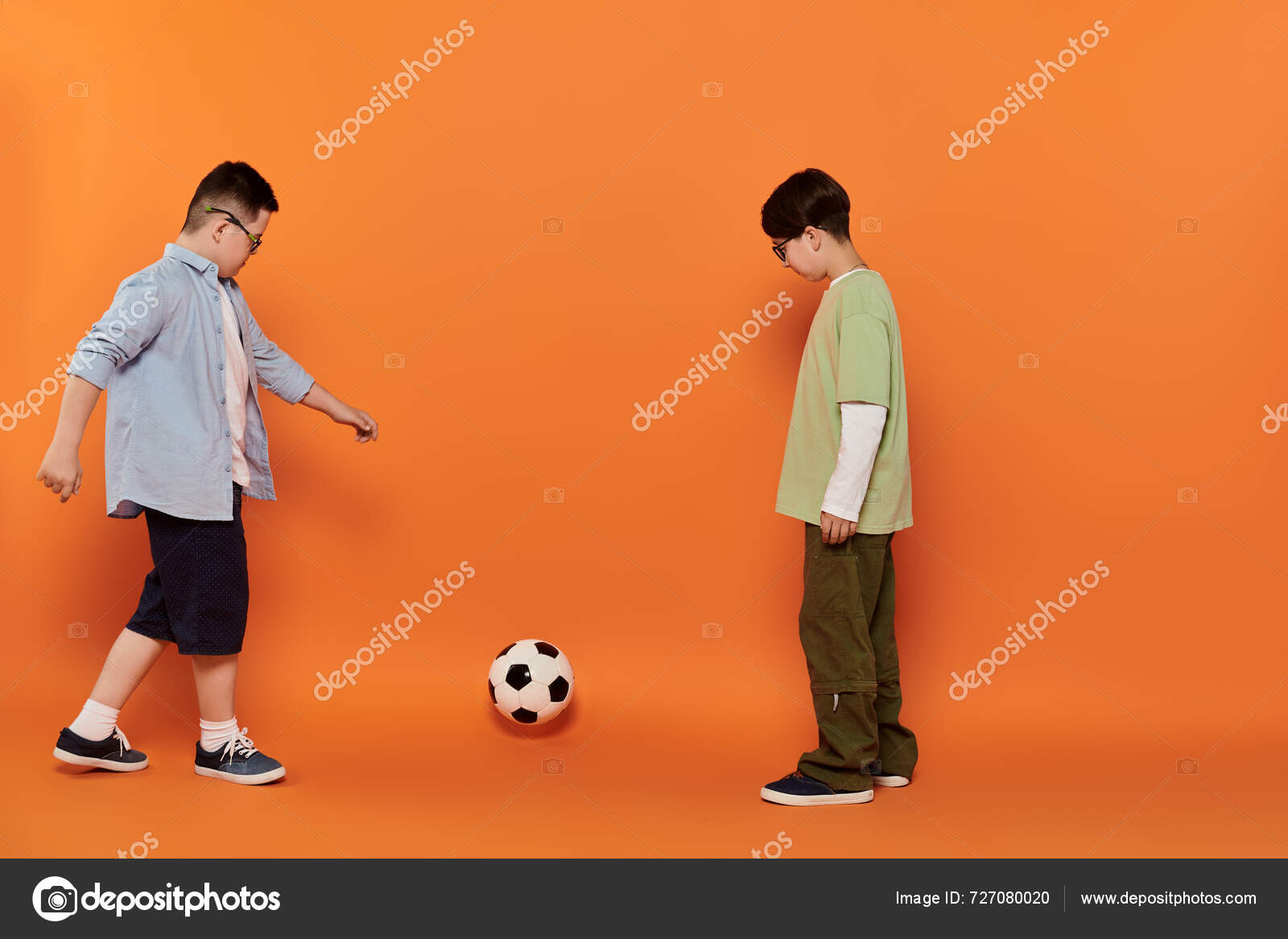Two Boys One Syndrome Play Soccer — Stock Photo © IgorVetushko #727080020