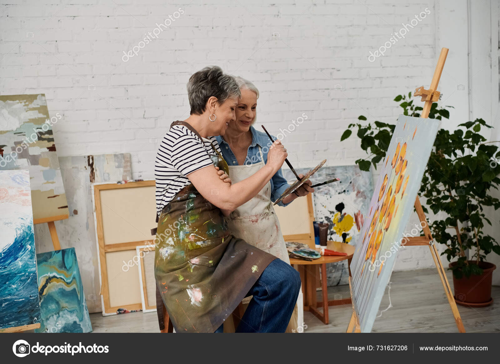 Two Women Art Smocks Paint Studio Front Woman Teaches Other — Stock ...