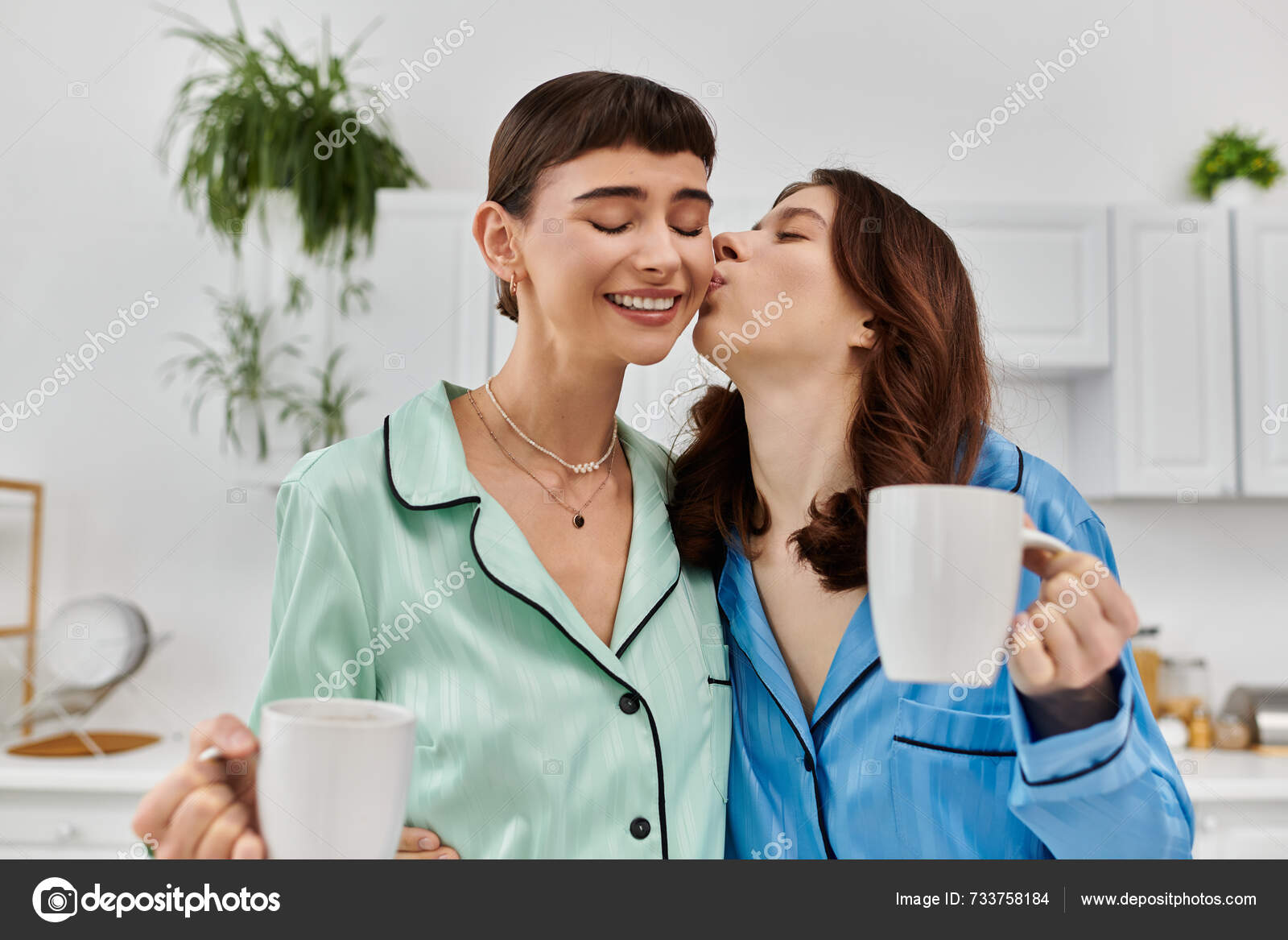 Young Couple Pajamas Share Tender Moment Kitchen One Woman Kissing ...