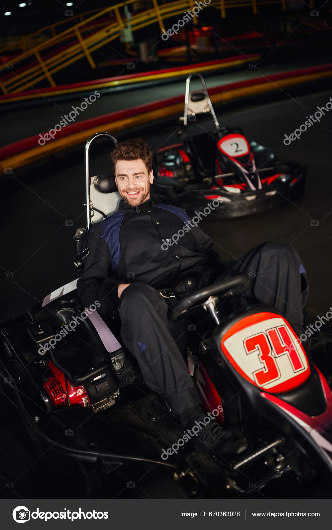 Cheerful Kart Driver Sportswear Sitting Racing Car Indoor Circuit ...