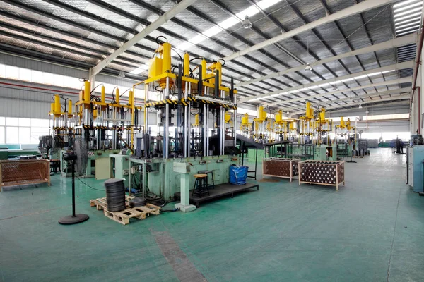 Tire assembly machine Stock Photos, Royalty Free Tire assembly machine ...