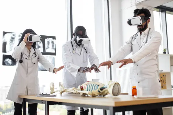 Group of multiethnic scientists, boiengeneers or doctors wearing ...