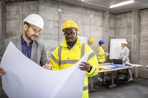 Structural Engineer Analyzing Building Plans Blueprint Construction ...