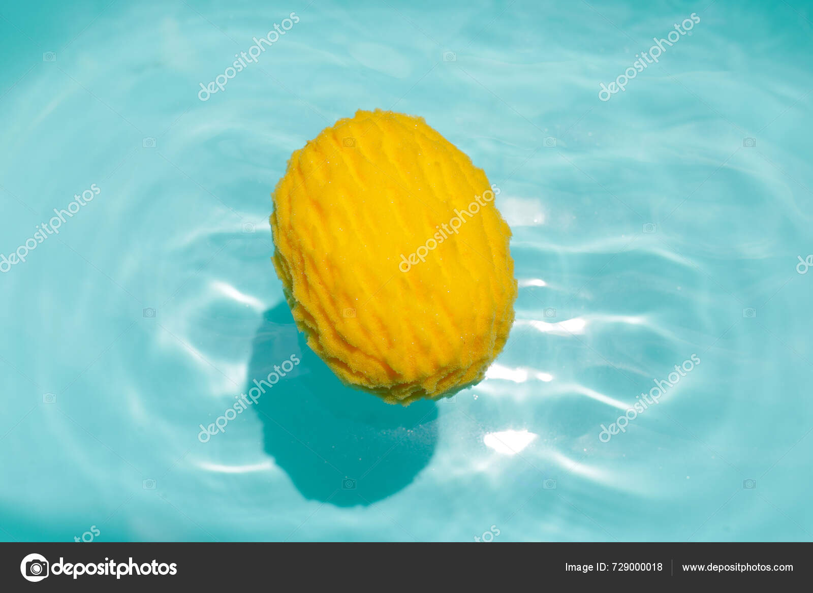 Yellow Bath Sponge Floating Blue Water — Stock Photo © Bowonpat #729000018