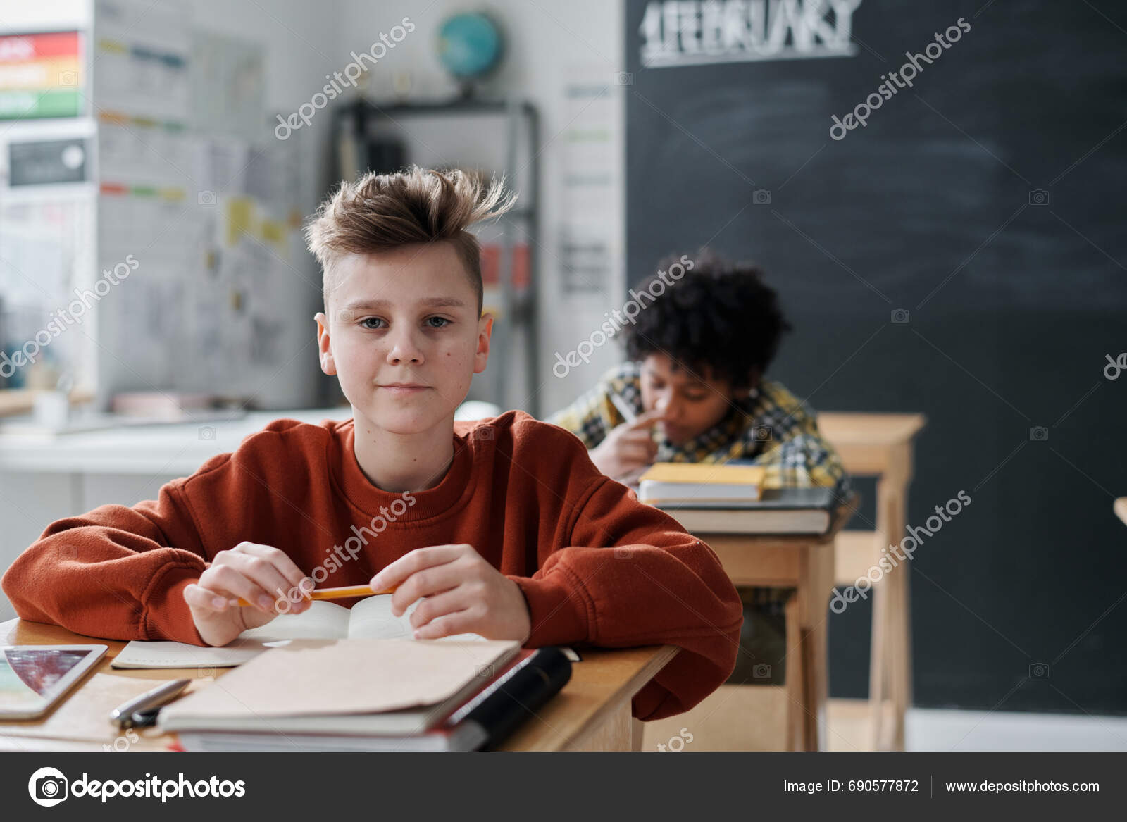 Portrait Schoolboy Looking Camera While Sitting Desk Books Digital Tablet — Stock Photo ...