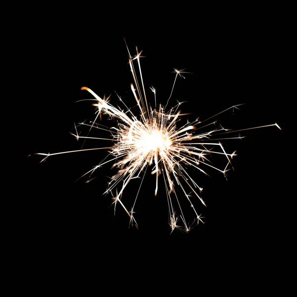 Sparkling burning sparkler on a black background. Isolated burning ...