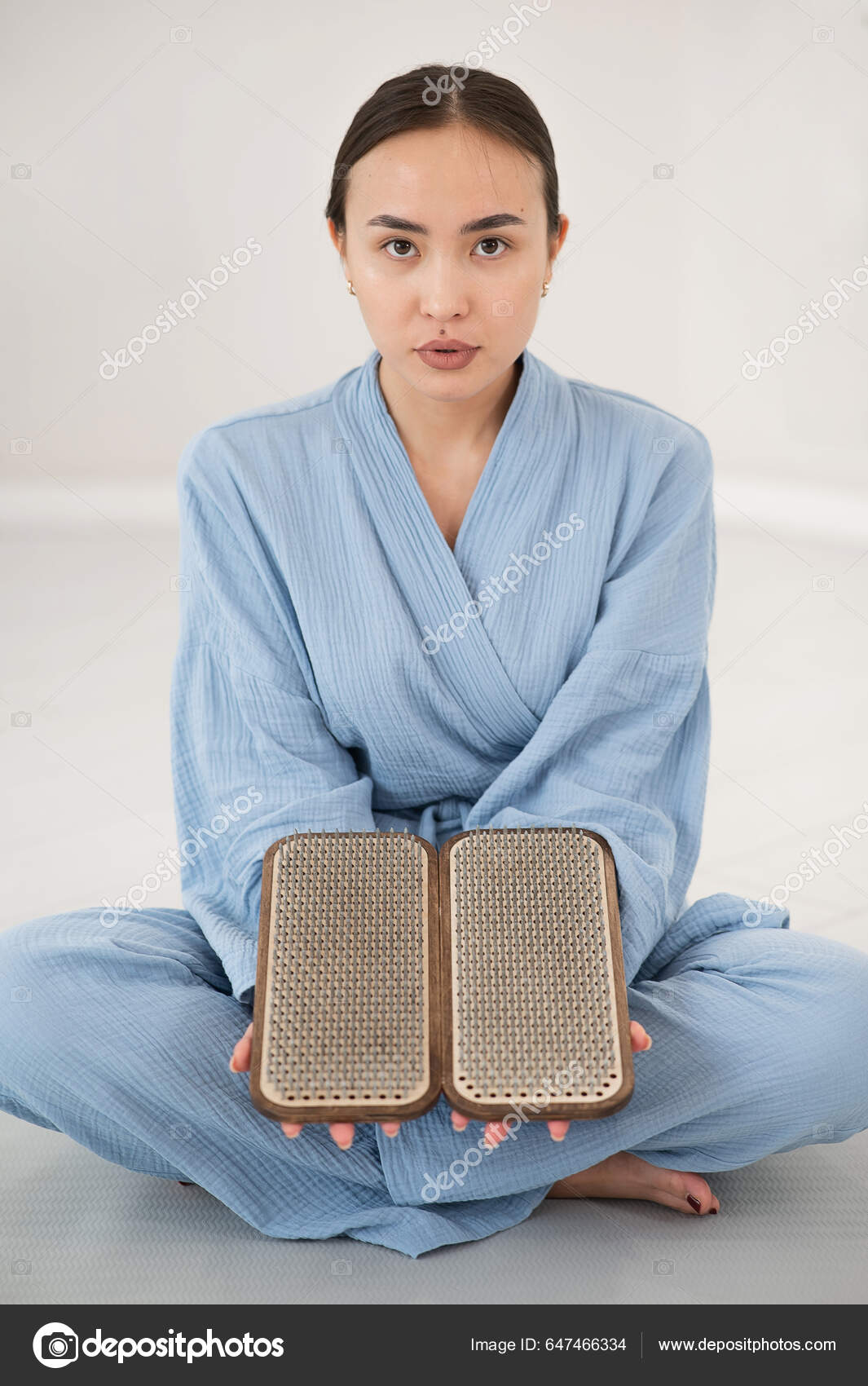 Asian Woman Sitting Lotus Position Yoga Mat Holding Sadhu Boards Stock ...