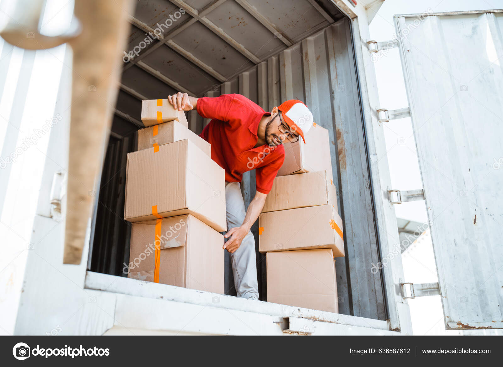 Delivery Man Red Uniform Unloads Several Boxes Container Freight ...