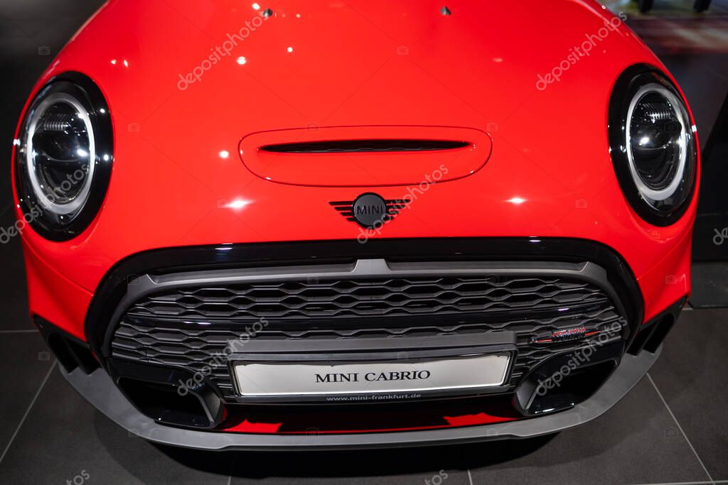 Red MINI Cooper Cabrio en showroom, automotive concern BMW Group ...