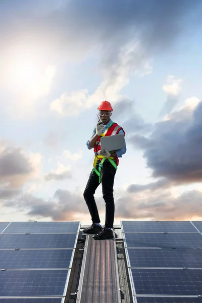 Engineer working setup Solar panel at the roof top. Engineer or worker ...