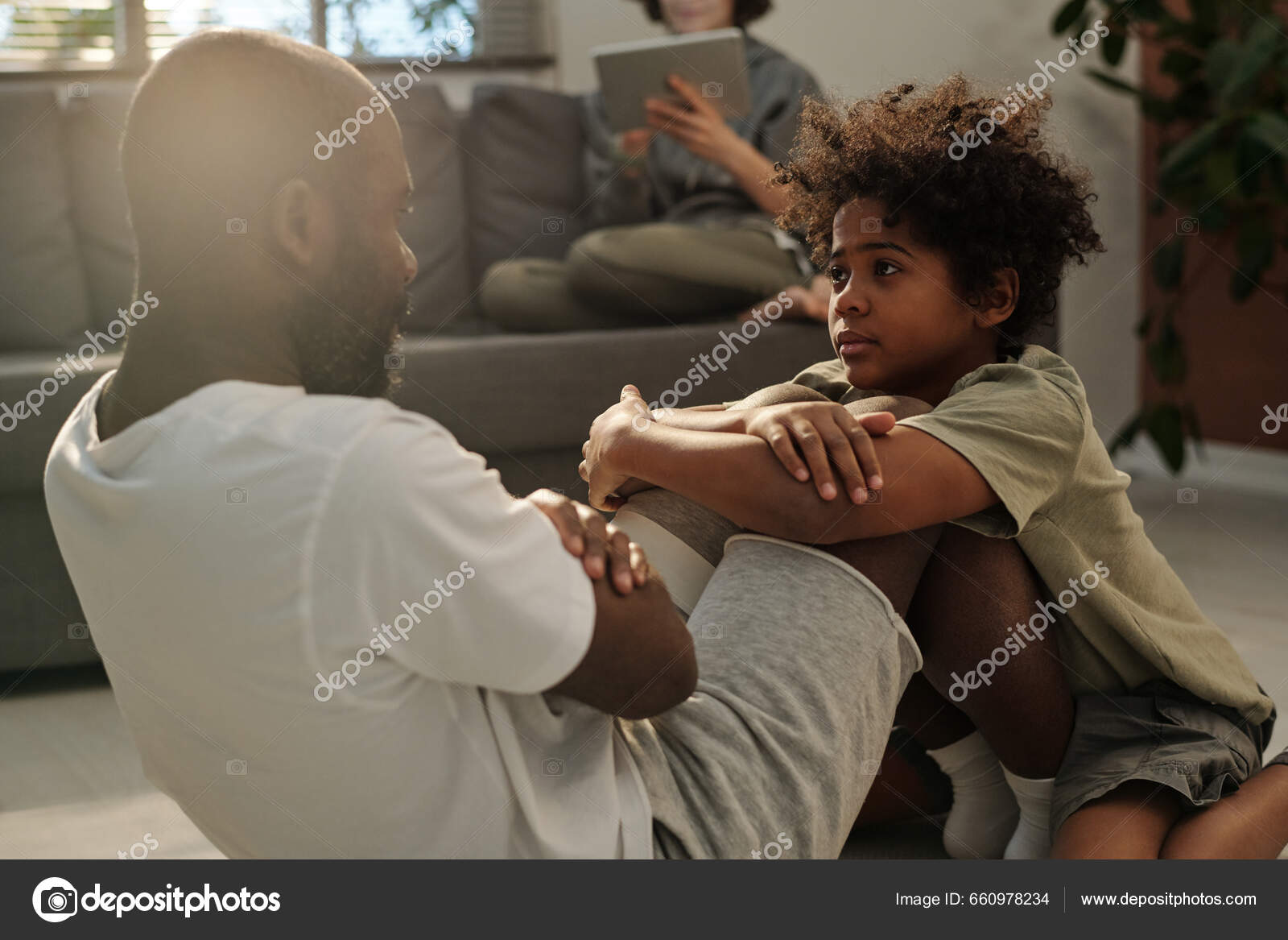 Cute Little Boy Looking His Father While Holding His Legs — Stock Photo ...