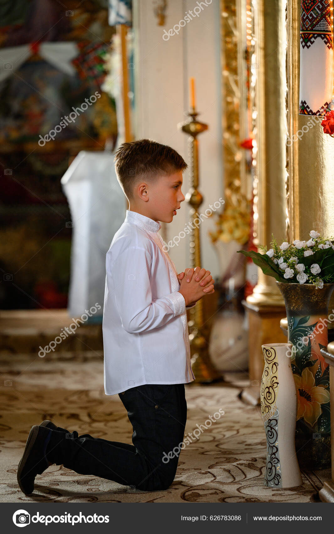 Child Kneeling In Prayer