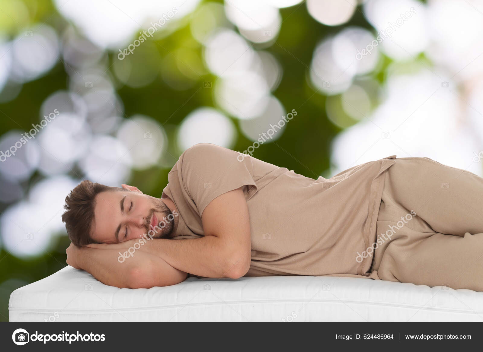 Man Sleeping Comfortable Mattress Blurred Green Background Bokeh Effect ...