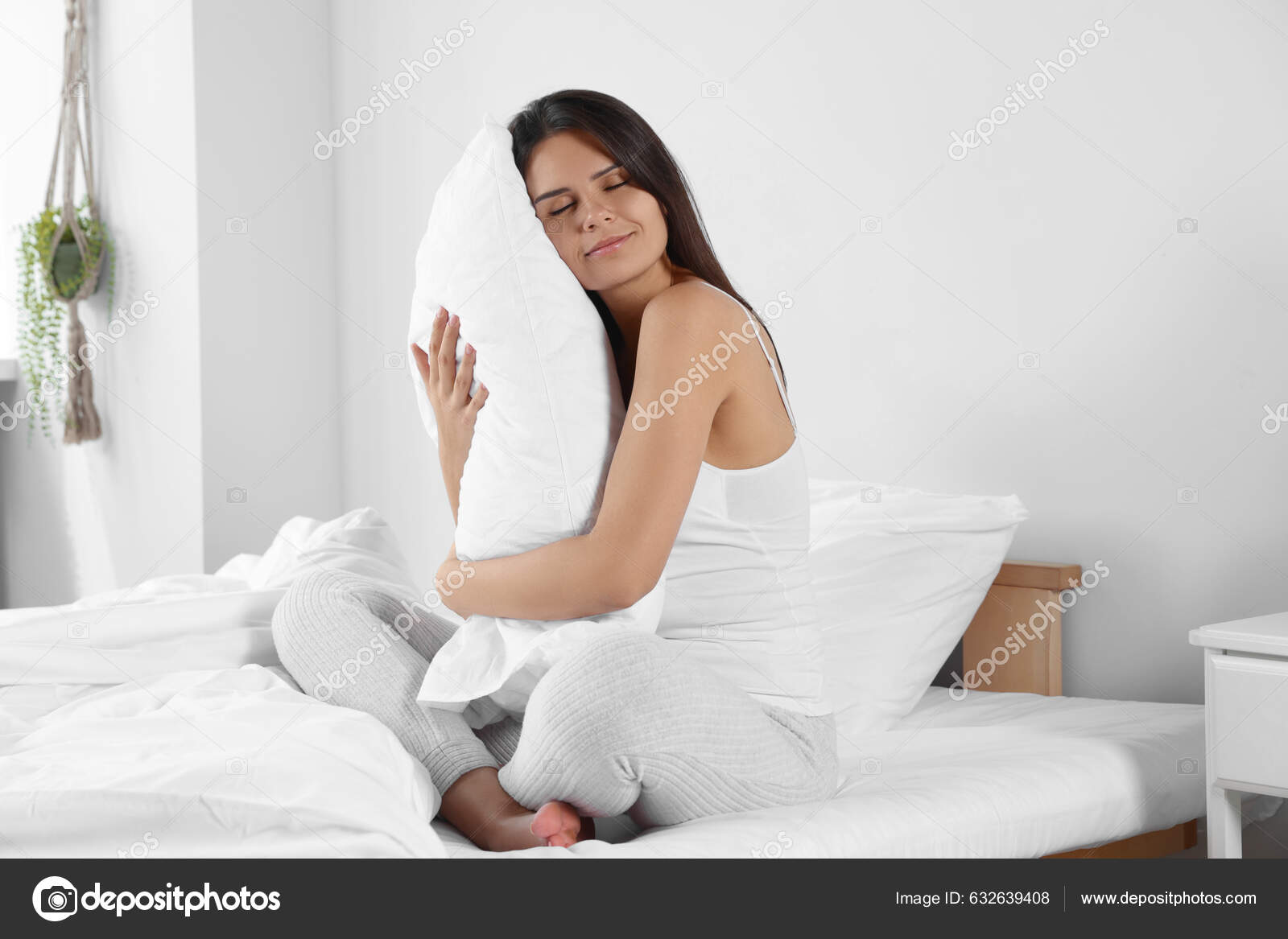 Beautiful Young Woman Hugging Pillow Bed Home Stock Photo by ©NewAfrica ...
