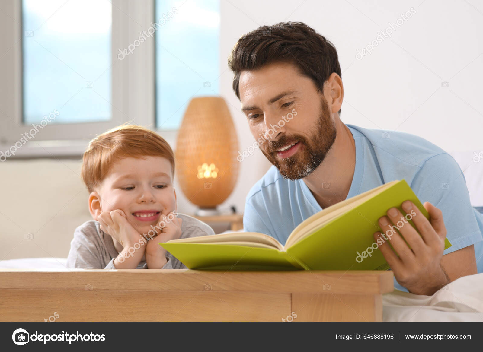 Father Reading Book His Child Bed Home — Stock Photo © NewAfrica #646888196