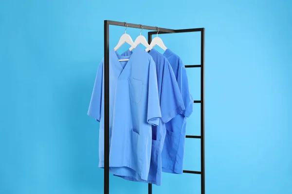 Medical scrubs hanger Stock Photos, Royalty Free Medical scrubs hanger ...