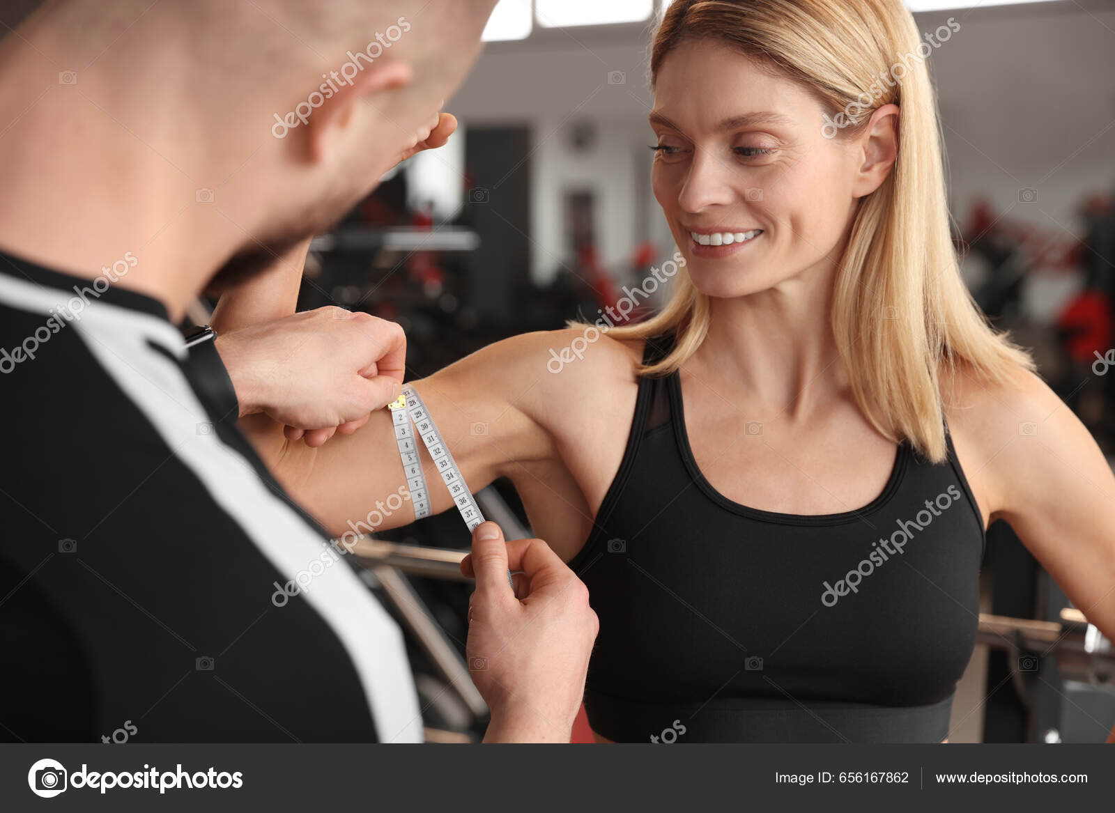 Trainer Measuring Woman Biceps Tape Gym — Stock Photo © NewAfrica ...