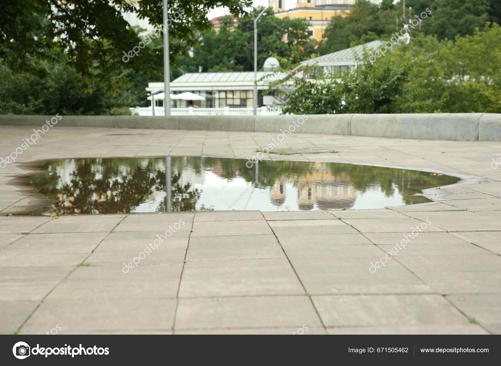 Puddle Rain Water Paved Pathway Outdoors — Stock Photo © NewAfrica ...