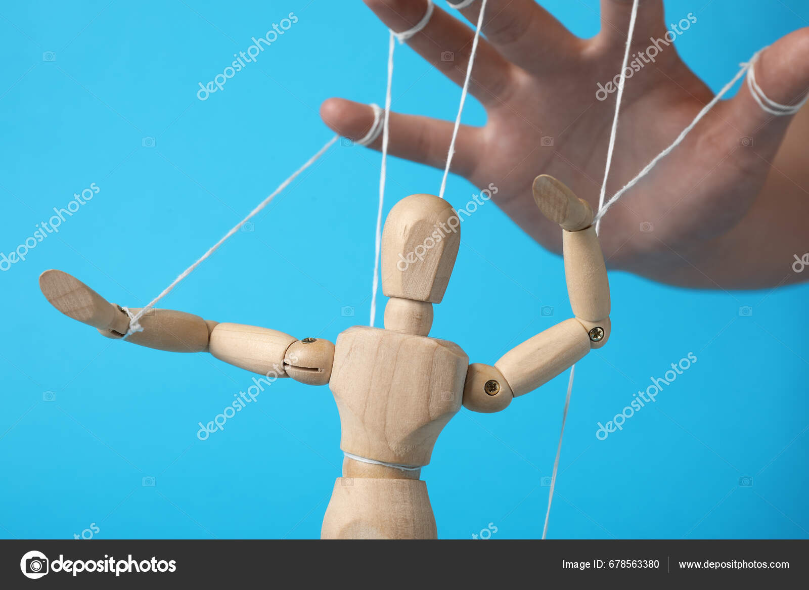 Woman Pulling Strings Puppet Light Blue Background Closeup — Stock Photo © NewAfrica #678563380