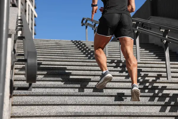 Man Running Stairs Outdoors Sunny Day Closeup — Stock Photo © NewAfrica ...