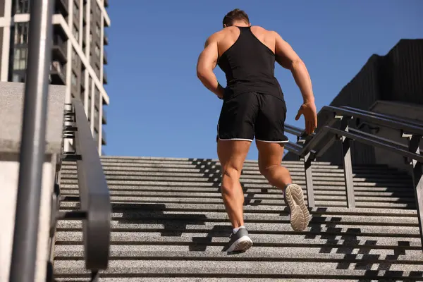 Man Running Stairs Outdoors Sunny Day Closeup — Stock Photo © NewAfrica ...