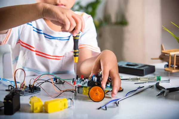 Little Child Tighten Nut Screwdriver Assemble Car Toy Asian Kid — Stock ...