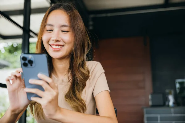 Beautiful Asian female has transfer money financial internet banking on ...