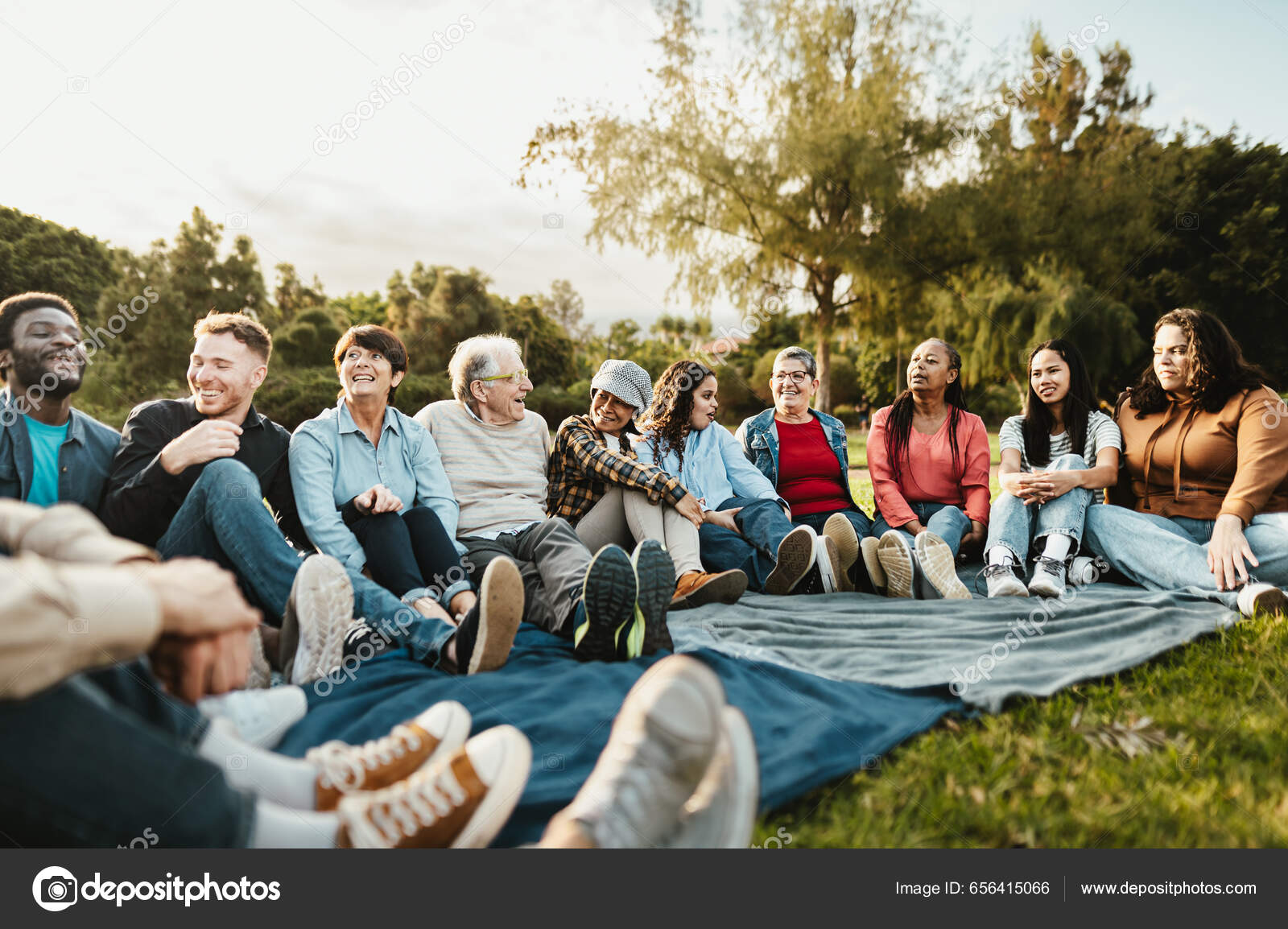 Happy Multi Generational People Having Fun Sitting Grass Public Park ...