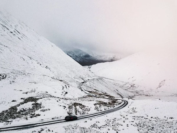 Snowy mountains roads Stock Photos, Royalty Free Snowy mountains roads ...
