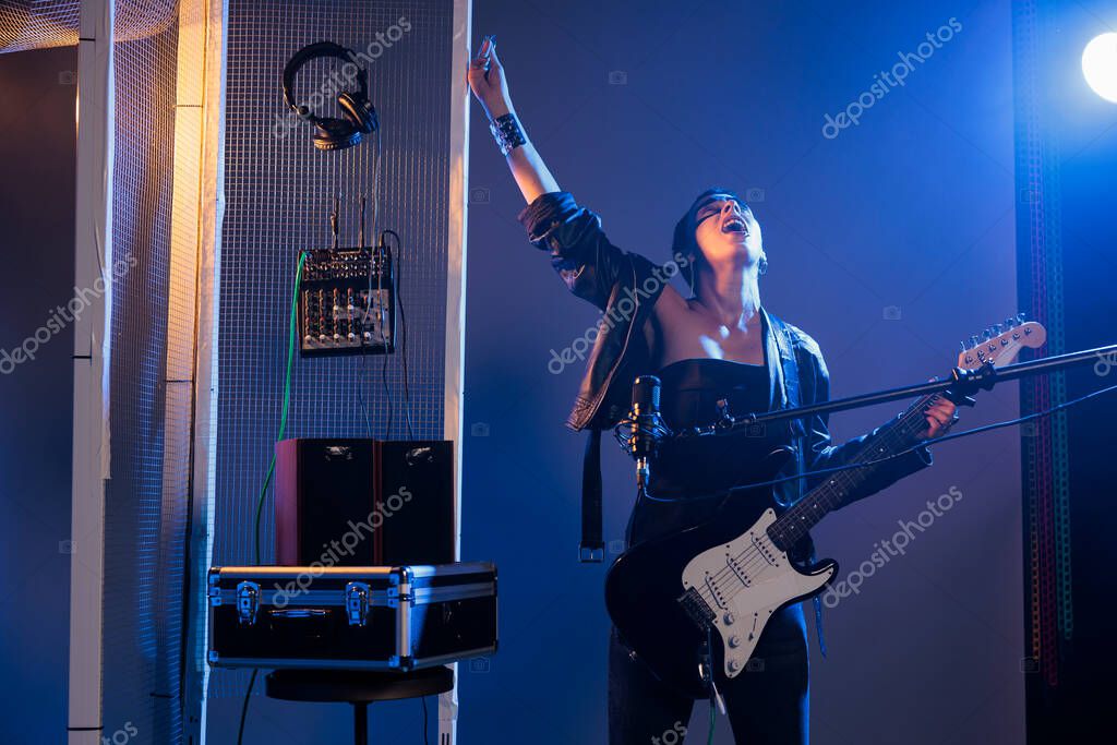 Punk rocker doing live performance in studio, creating funky cool vibe ...