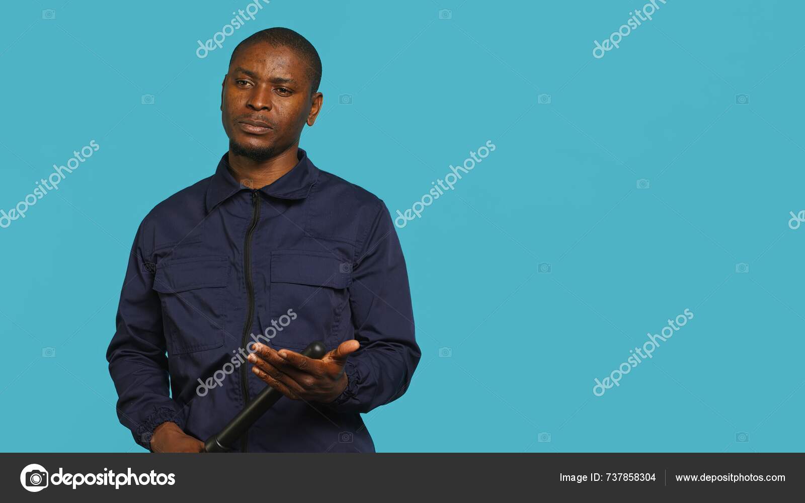 Portrait Security Guard Menacingly Smacking Hand Baton While Overseeing ...