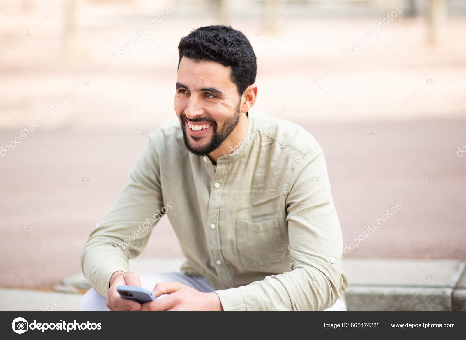 Man Sitting Facing Away