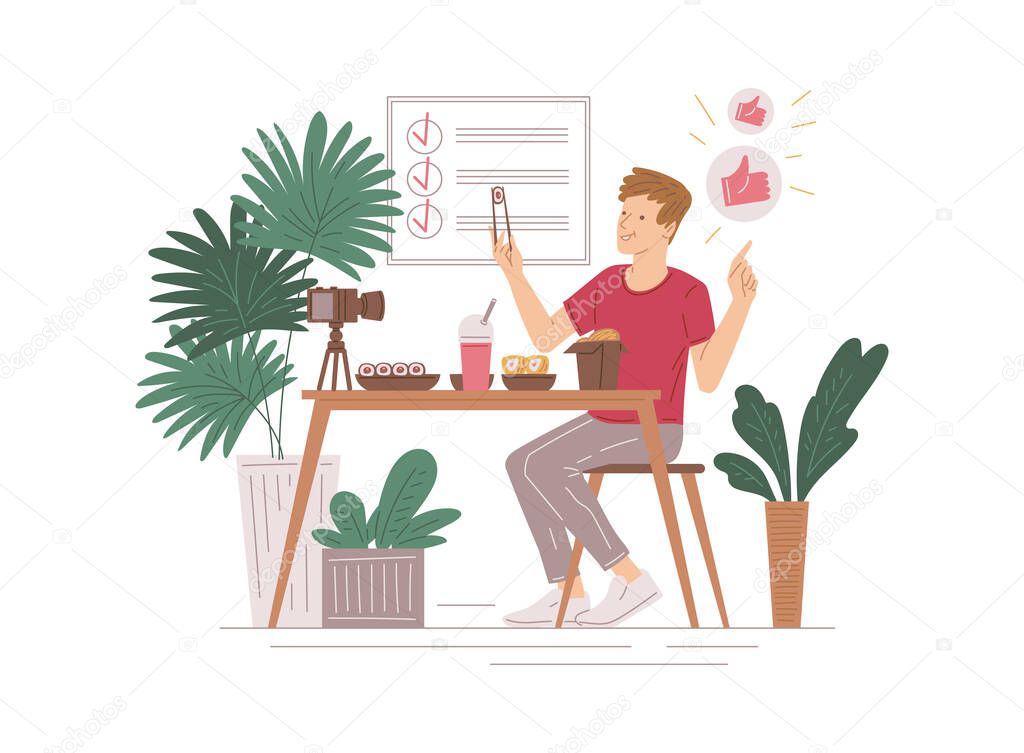 Hombre feliz probando comida en la mesa detr s de la c mara de video. Vlogger o cr tico de ...