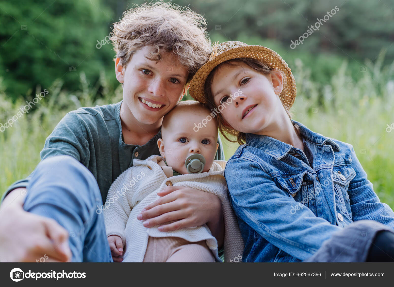 Portrait Three Children Siblings Sitting Grass Having Fun Together ...