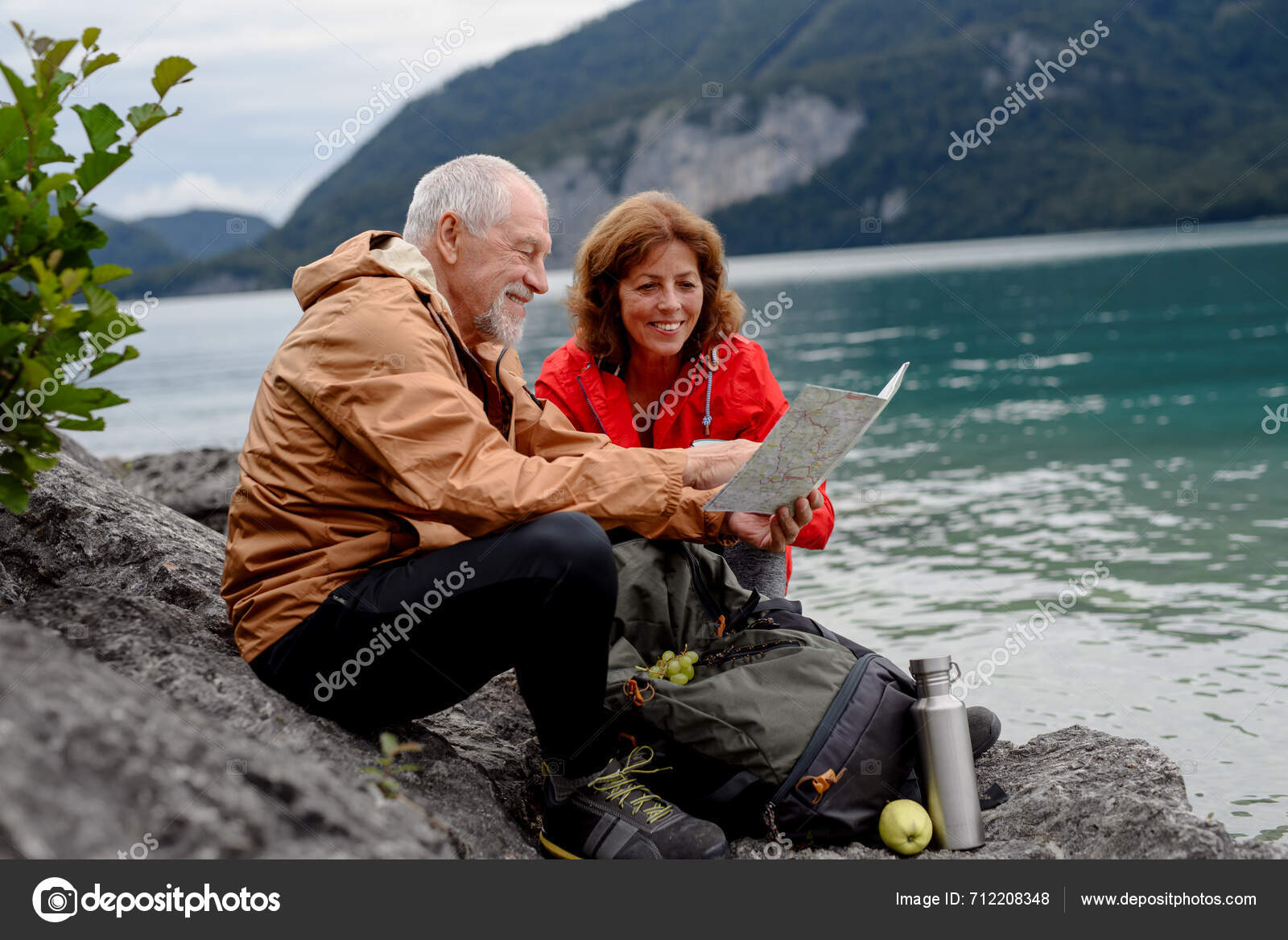 Active Elderly Couple Hiking Together Mountains Checking Trail Map Drinking — Stock Photo ...