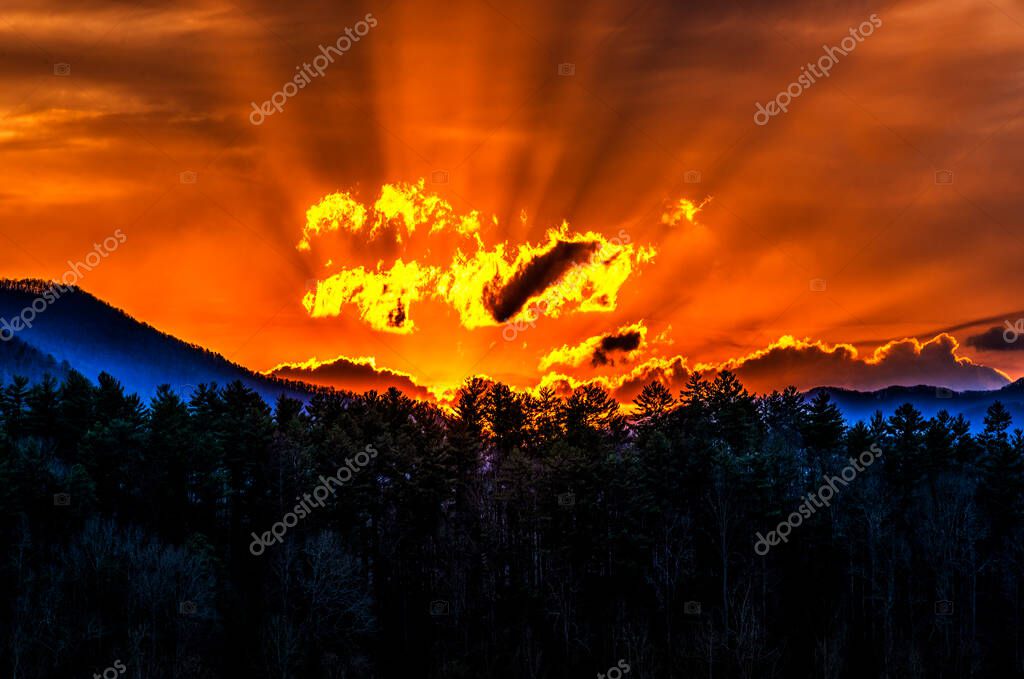 The sun comes up on a cold morning in the Cades Cove section of the ...