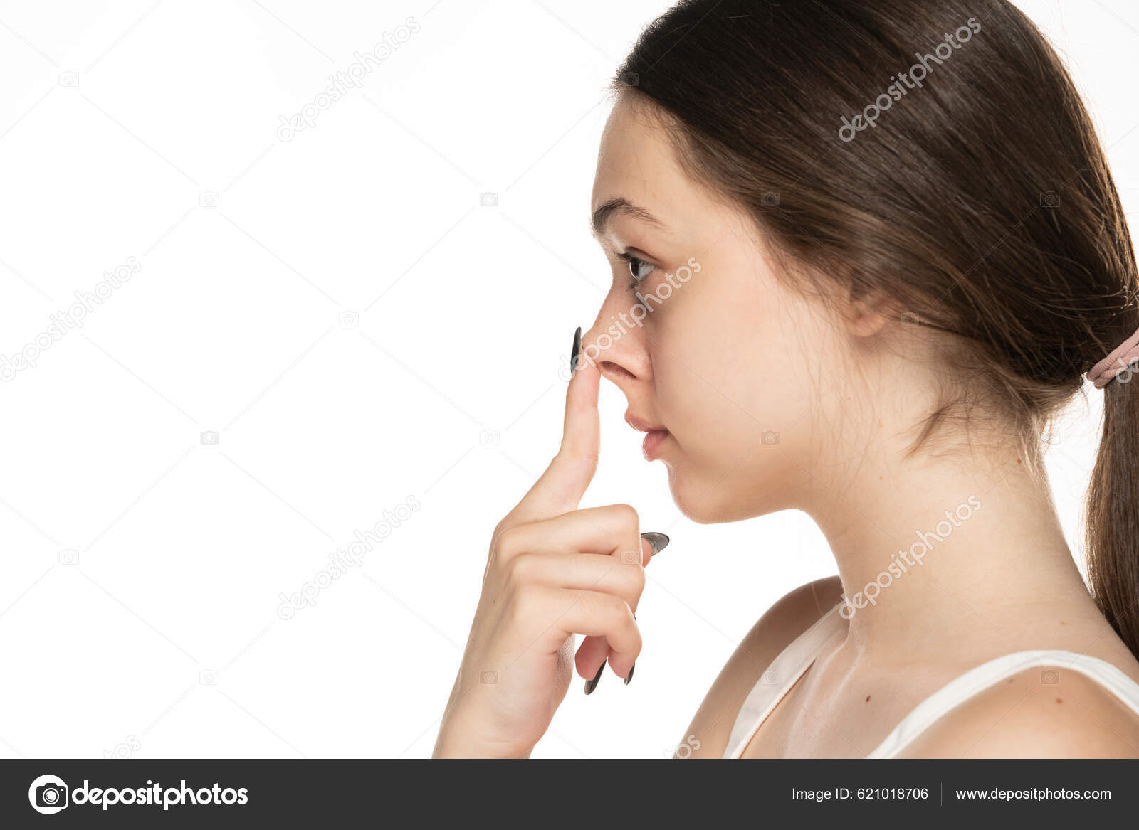 Young Serious Woman Touches Her Nose Her Fingers White Background ...