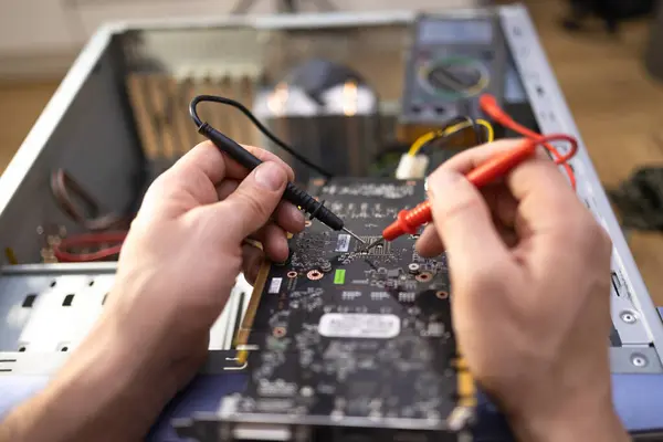 Close-up image of technician man hand measuring electrical voltage of ...