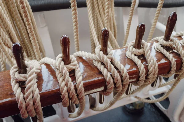 Nautical details on boat deck with rope and marine tool - Stock Image ...