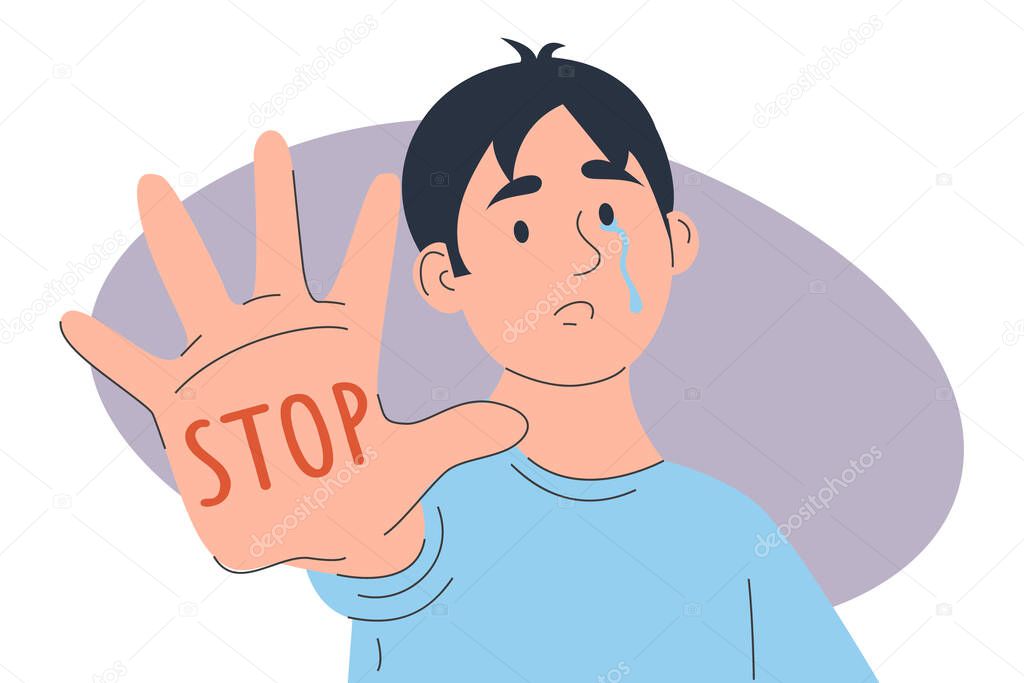 Niño llorando y mostrando la palma de la mano con la palabra stop ...