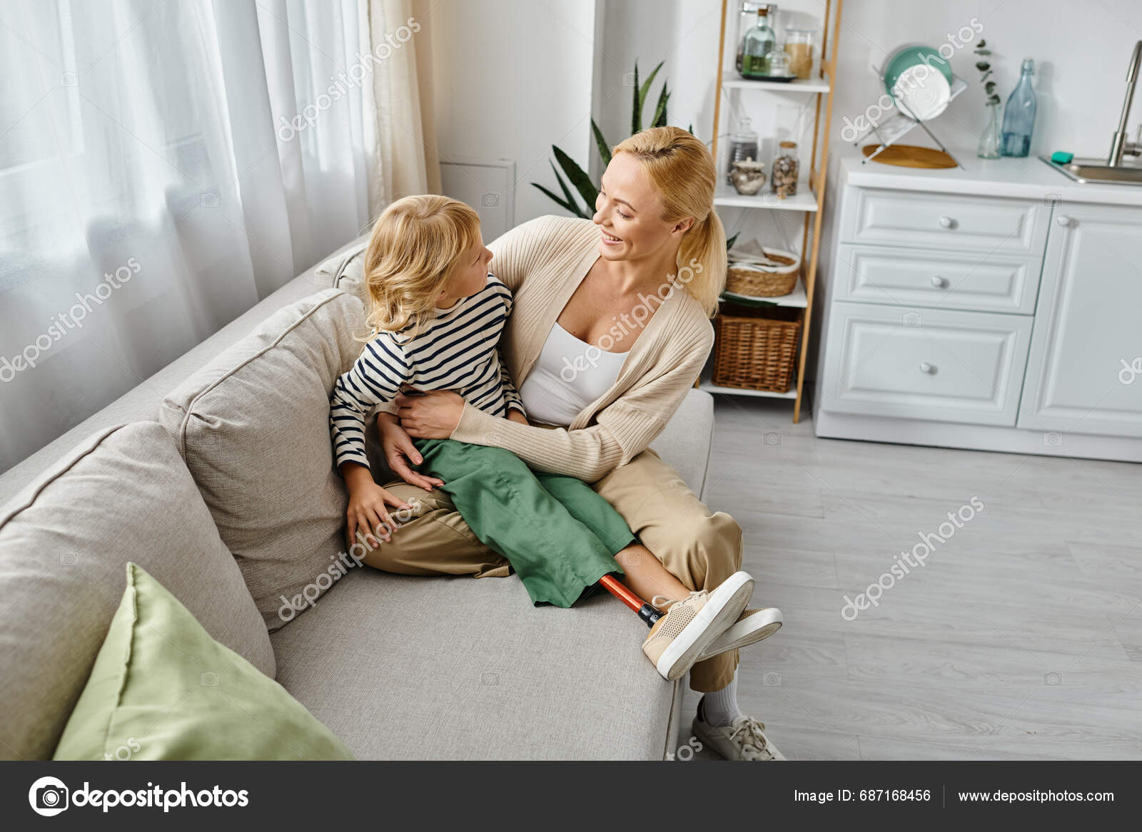 Joyful Mother Hugging Daughter Prosthetic Leg Sitting Together Sofa ...