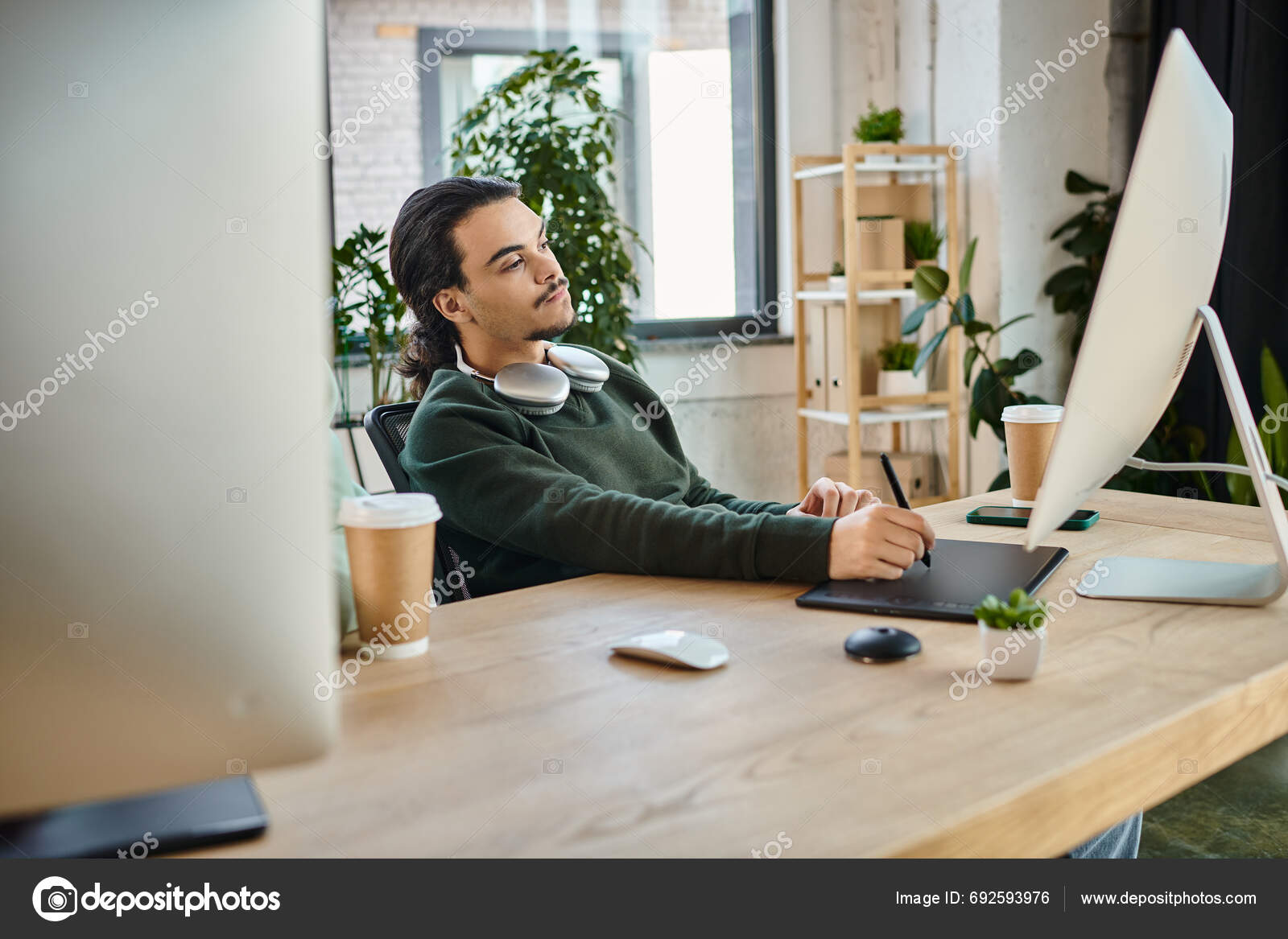 Young Professional Doing Post Production Work Focused Retouching Tablet ...