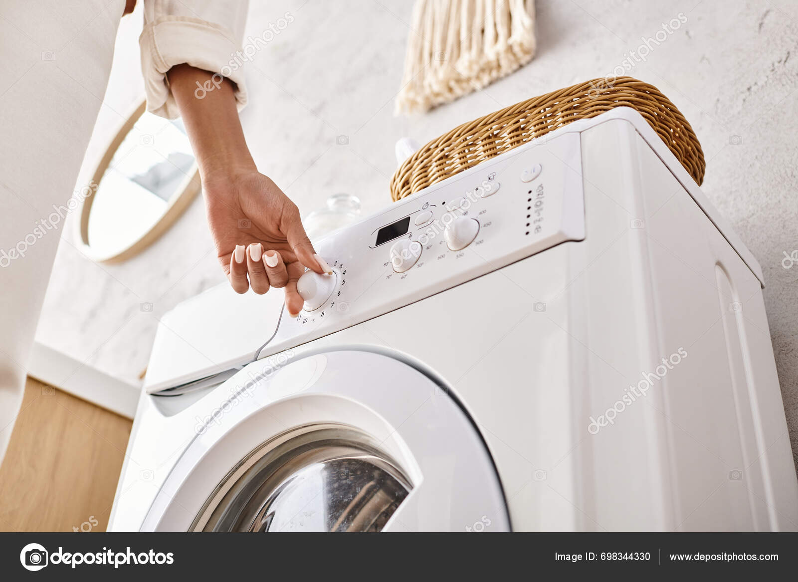 African American Woman Pressing Button Washing Machine Bathroom Doing ...