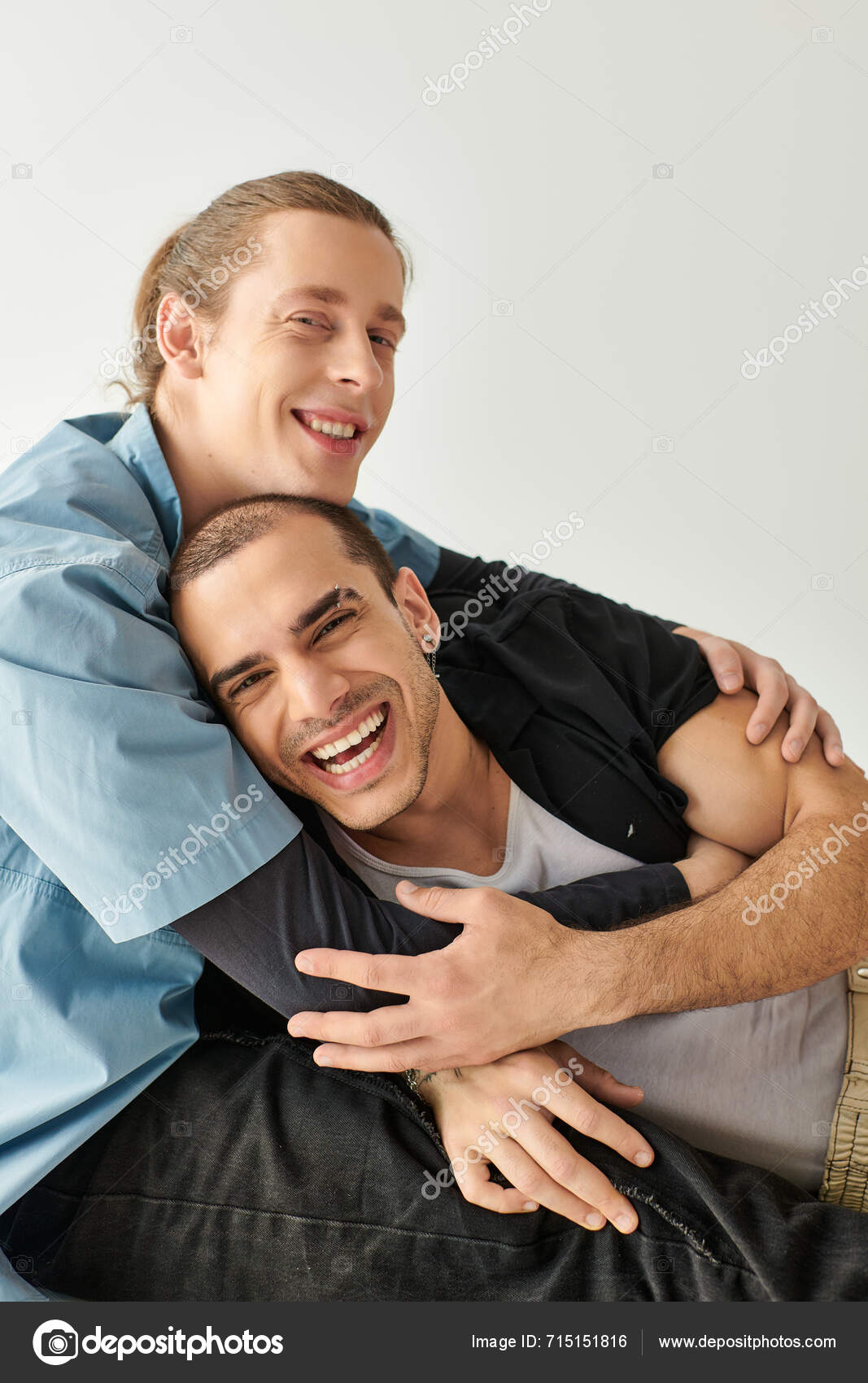 Two Men Display Affection Sitting Closely Couch Hugging Each Other ...