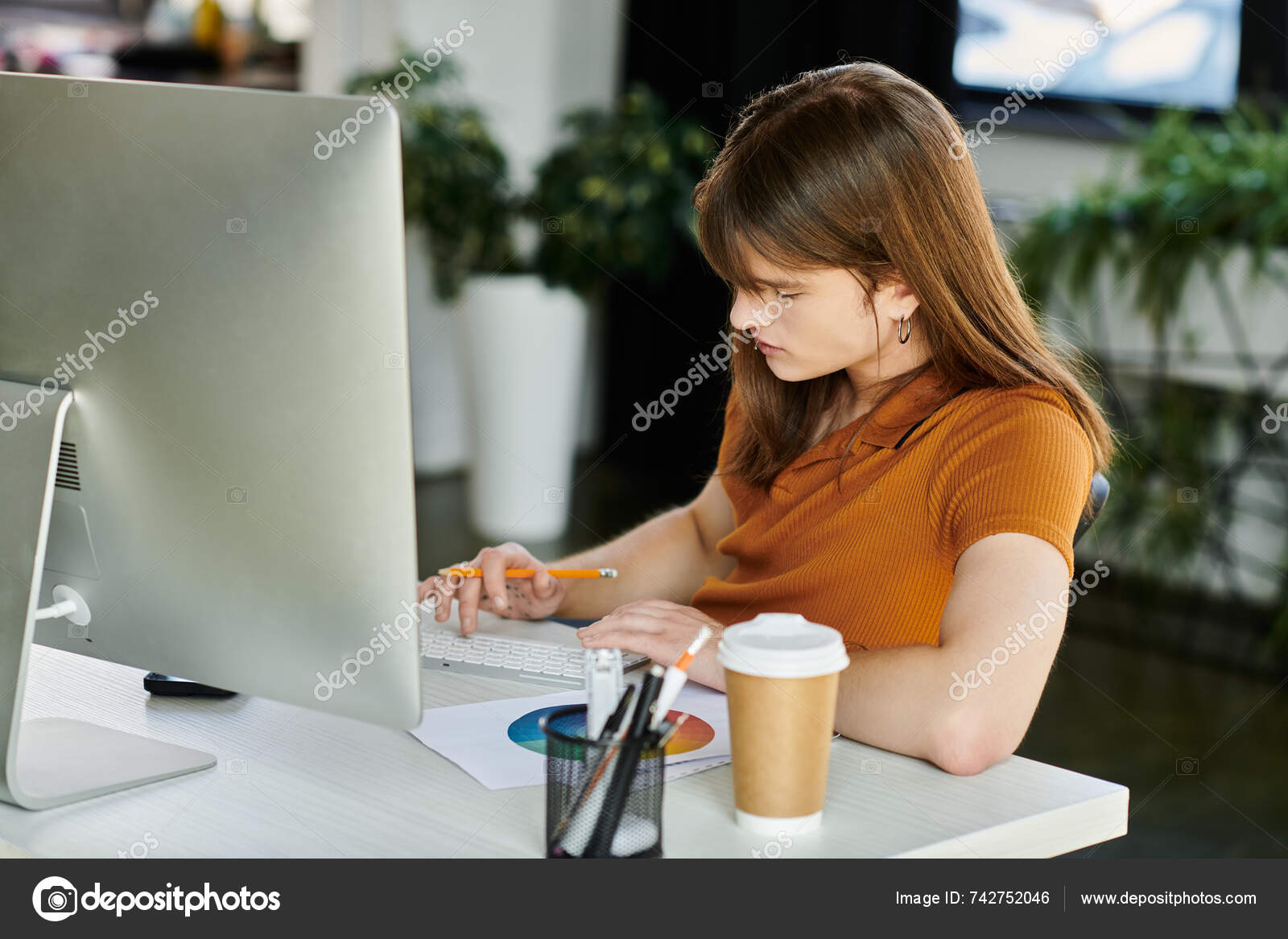 Focused Individual Vibrant Office Thoughtfully Creates Designs While ...